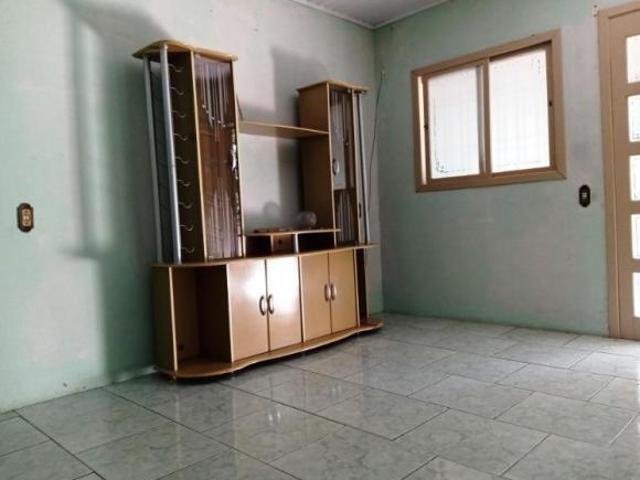 Casa à venda em Porto Alegre RS, bairro Costa E Silva: 2 quartos, 1 sala, 2 banheiros, 3 vagas de ga