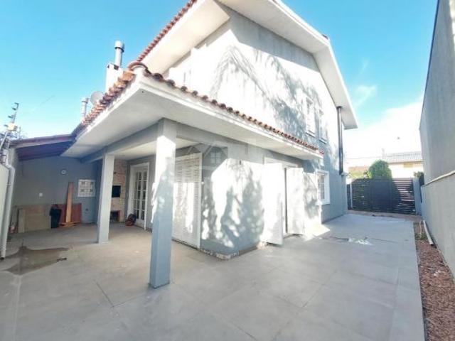 Casa à venda em Porto Alegre RS, bairro Hípica: 4 quartos, 1 suíte, 2 salas, 3 banheiros, 2 vagas, 1