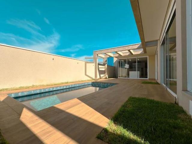 Casa à venda em Paulínia, Parque Brasil 500, com 4 suítes, com 211.78 m², Santorini Residencial Club