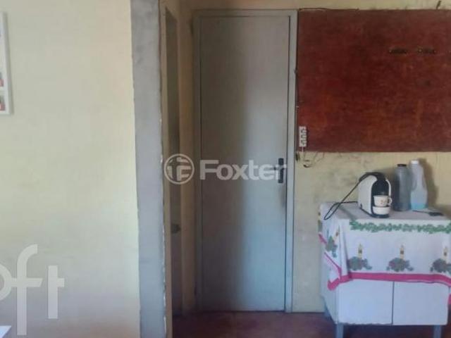 Casa à venda em Rubem Berta com 153 m², 3 quartos, 2 vagas