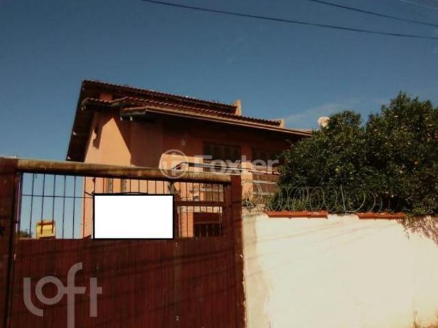 Casa à venda em Rubem Berta com 210 m², 3 quartos, 1 suíte, 4 vagas
