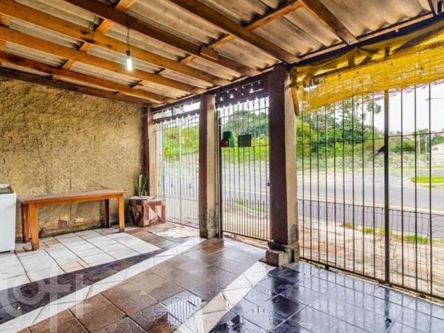 Casa à venda em Rubem Berta com 84 m², 1 quarto, 1 vaga