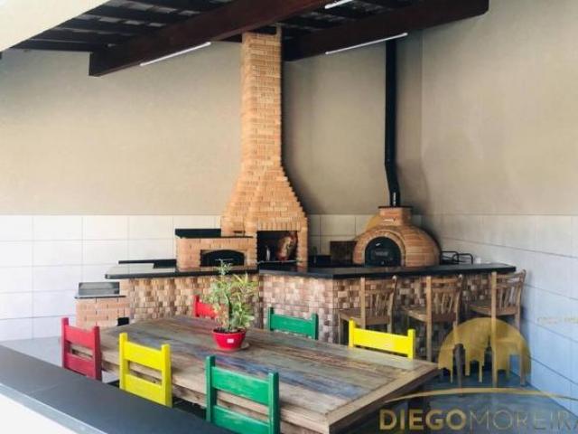 Casa À venda em Terra Preta com 3 dormitórios, suíte com hidromassagem