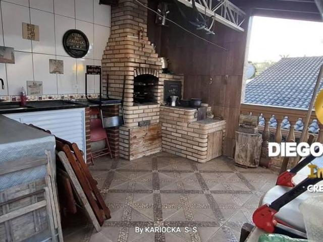 Casa à Venda em Terra Preta – Conforto, Lazer e Qualidade de Vida!