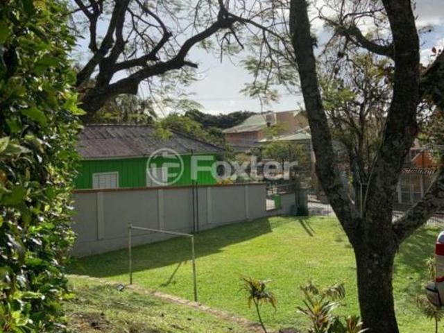 Casa à venda em Tristeza com 240 m², 4 quartos, 2 suítes, 4 vagas