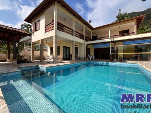 Casa à venda em Ubatuba. Praia da Lagoinha. Condomínio alto padrão. 5 suítes