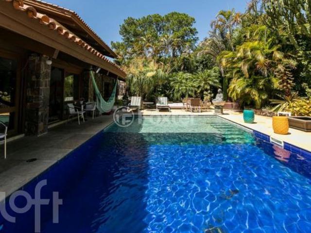 Casa à venda em Vila Assunção com 768 m², 5 quartos, 3 suítes, 7 vagas