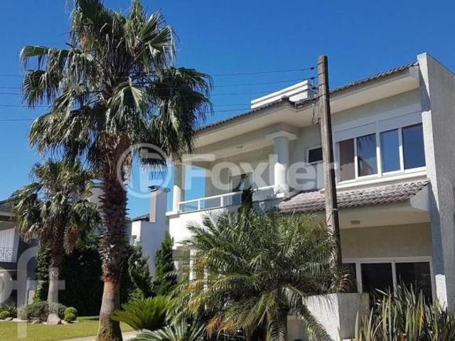Casa à venda em Zona Nova com 354 m², 6 quartos, 5 suítes, 4 vagas