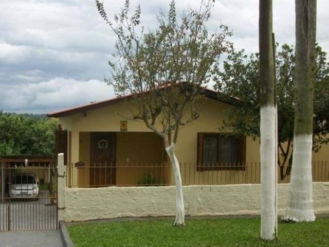 casa à venda localizada na tranquila Rua Piacaba