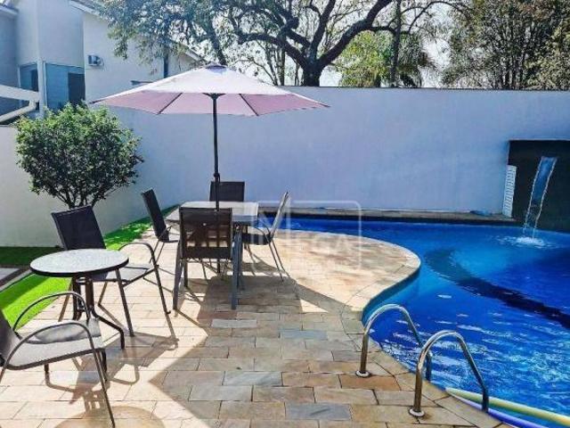 Casa à venda no condominio tarumã com 5 suítes e piscina