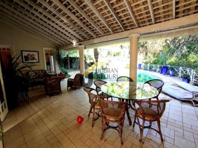 Casa à venda no condomínio Alphaville Campinas com 5 suítes, piscina e espaço gourmet