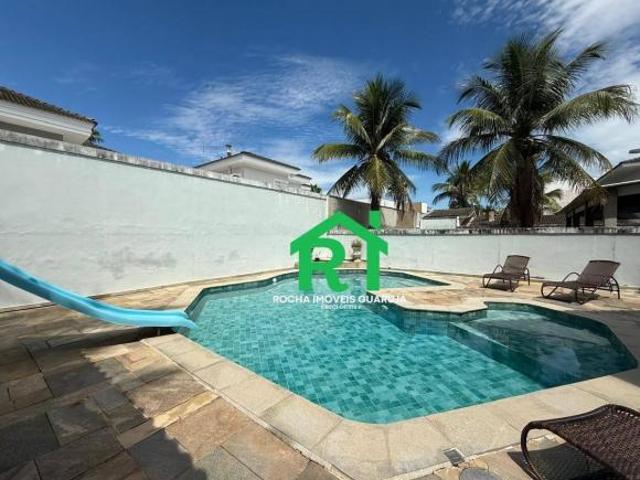 Casa à venda no Condomínio Jardim Acapulco com piscina e espaço gourmet – Guarujá/SP
