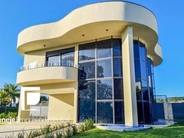 CASA A VENDA NO CONDOMÍNIO RESERVA PORTA JAPY, ARQUITETURA MODERNA EM UM CONDOMÍNIO GOLF CLUBE COM E