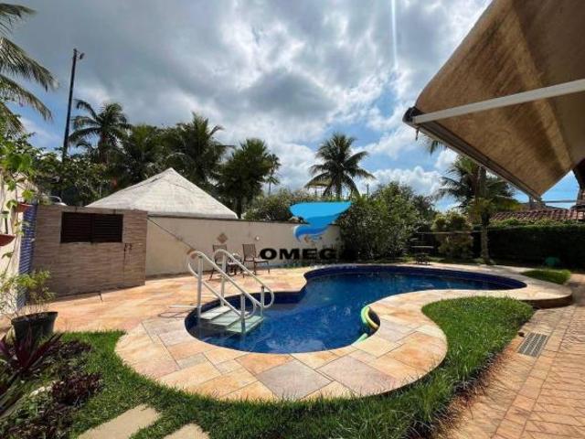 Casa à venda no conodminio Granville Guarujá/SP | Omega imóveis