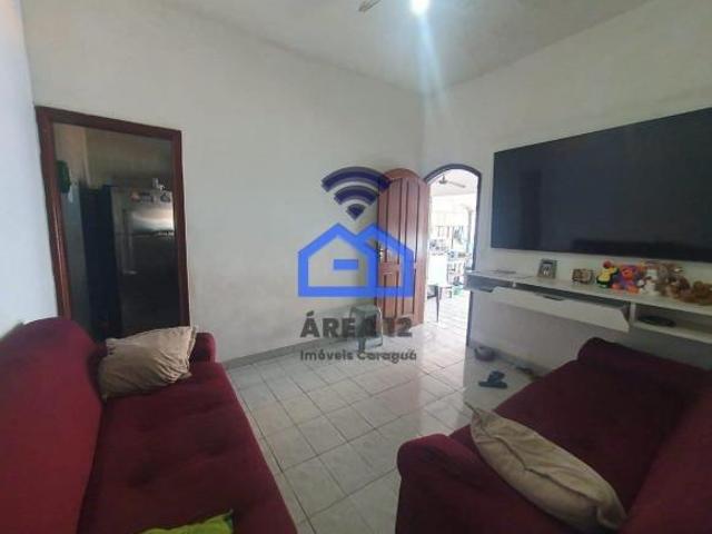 Casa à Venda no Centro com 3 dormitórios, sendo 1 suíte, sala ampla, cozinha, 4 vagas de garagem em