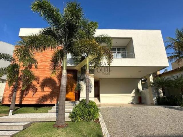 Casa à venda no Alphaville Campinas com 4 suítes, lazer privativo e garagem para vários carros