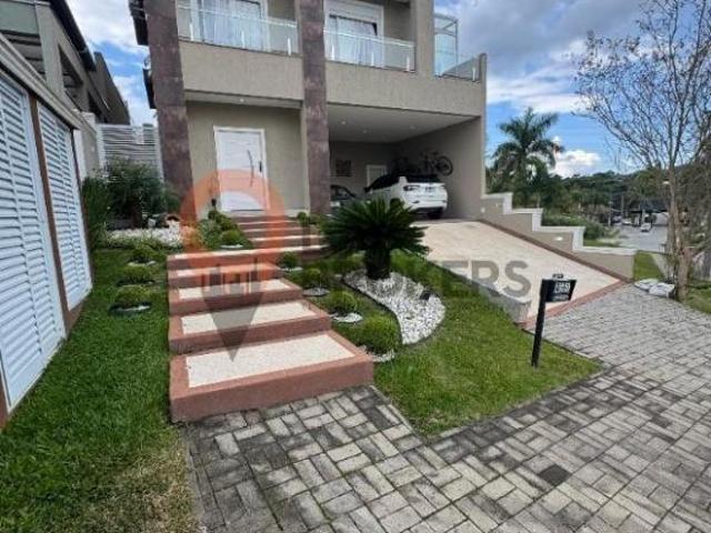 Casa à venda no Aruã Brisas em Mogi das Cruzes | 3 suítes e 4 vagas