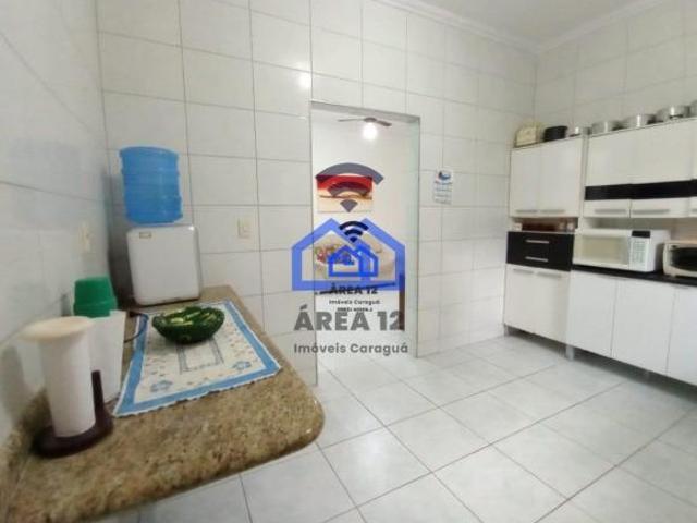 Casa à venda no bairro Martin de Sá em Caraguatatuba, ótima localização a 10 minutos do centro da ci