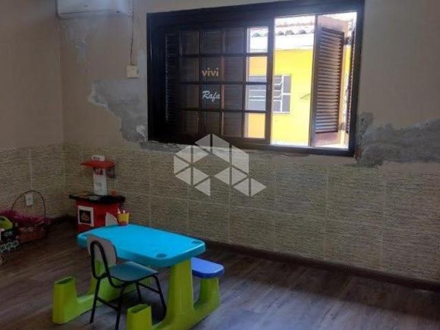 Casa a venda no bairro cavalhada, terreno de 12,50 x 25