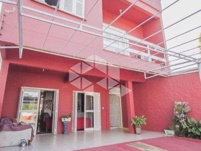 Casa à venda no bairro Cristal Espaço, conforto e lazer para sua família