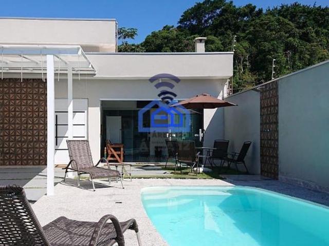 Casa à venda no bairro do Massaguaçu em Caraguatatuba, SP 3 dormitórios, sendo 1 suíte, área gourm