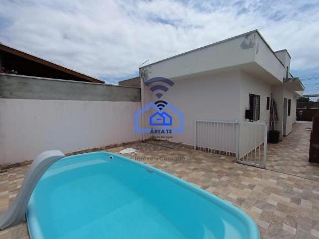 Casa à Venda no bairro do Morro do Algodão em Caraguatatuba, SP Duas suítes e Piscina em 180m² de