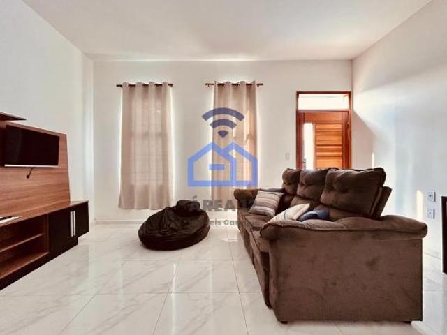 Casa à venda no bairro do Golfinho em Caraguatatuba, SP 2 dormitórios, cozinha americana, garagem