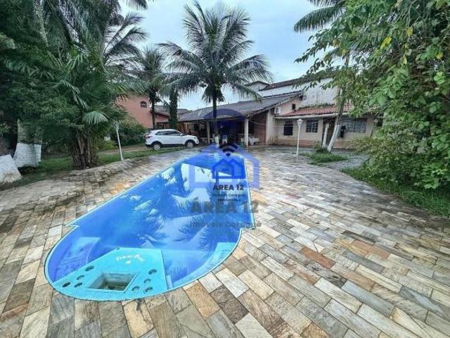 Casa à venda no bairro do Indaiá, com 03 dormitórios, sendo 01 suíte, piscina e quintal amplo em Car