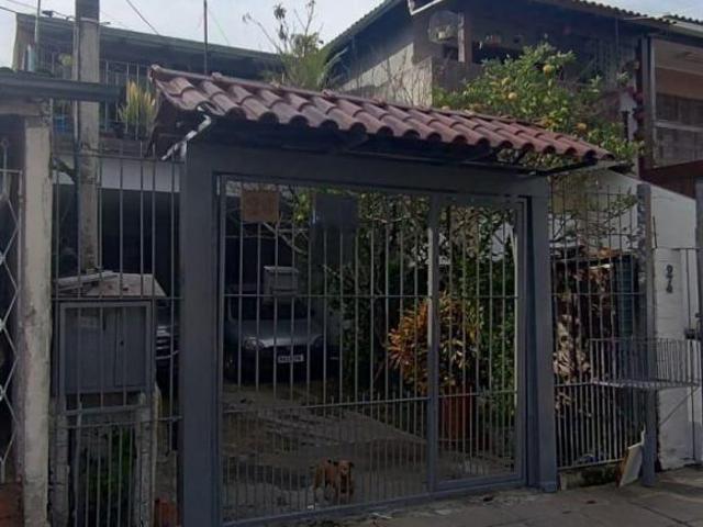 Casa a venda no Bairro Hípica 3 dormitórios 2 vagas