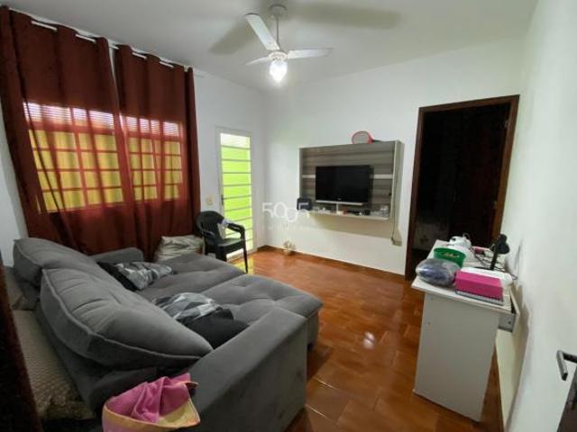 Casa à venda no bairro Parque Nossa Senhora da Candelária com 2 dormitórios