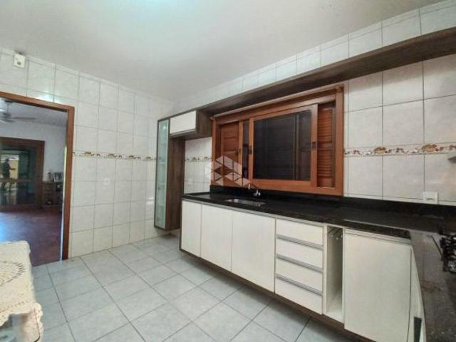 Casa a venda no bairro Primavera em Novo Hamburgo/RS, 3 dormitórios sendo 1 suít