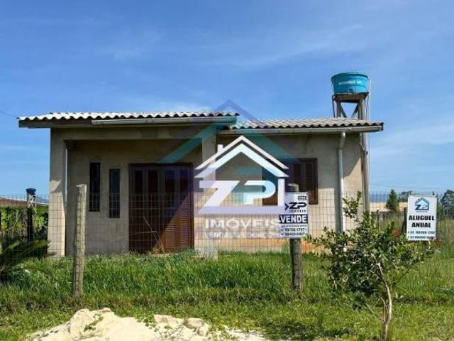 Casa à venda no bairro Quatro Lagos em Arroio do Sal/RS