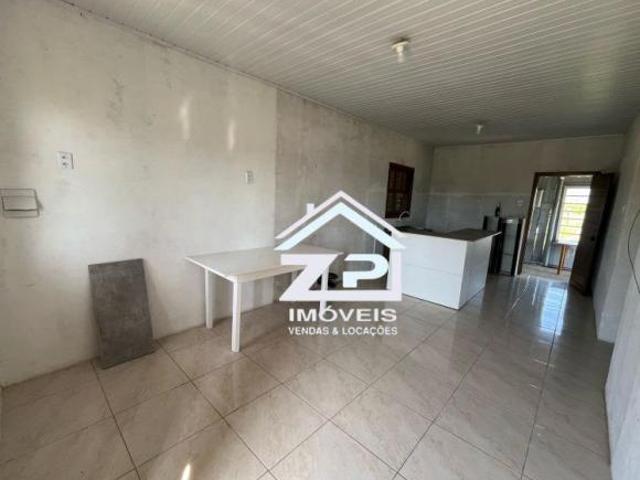 Casa à venda no bairro Quatro Lagos em Arroio do Sal/RS