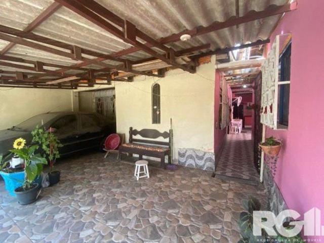 Casa à venda no bairro Restinga | Localizada na primeira unidade, com 2 dormitórios, sala e cozinha