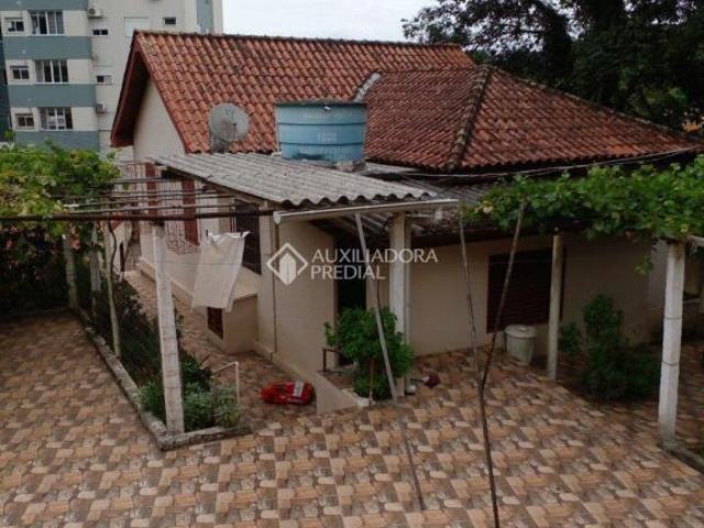 Casa à venda no Bairro Tarumã em um terreno de 718 m²
