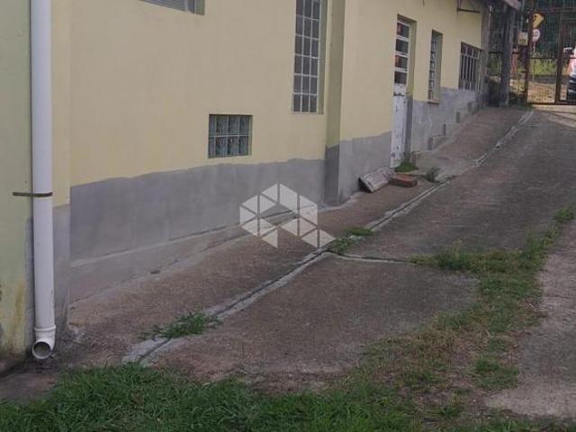 Casa à venda no bairro Vila Nova em Porto Alegre RS
