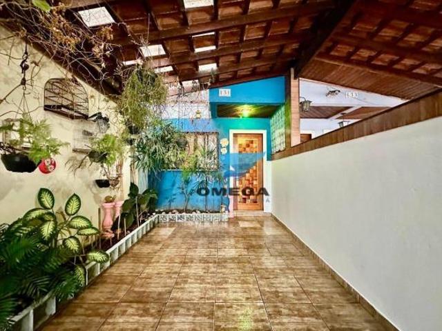Casa à venda no Jardim dos Pássaros no Guarujá | Omega Imóveis