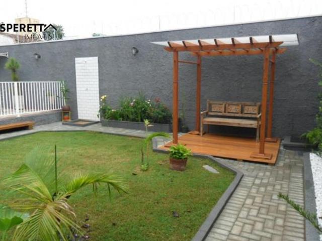 Casa à venda no Jardim Pacaembu, Jundiaí, com 3 dormitórios, suíte, 3 salas e área gourmet. Espaçosa