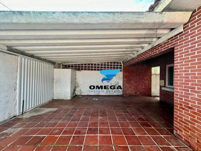 Casa à venda no Jardim Primavera no Guarujá | Omega Imóveis