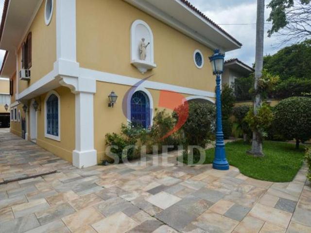 Casa á Venda no Jardins com 4 quartos sendo 3 suítes, 7 vagas