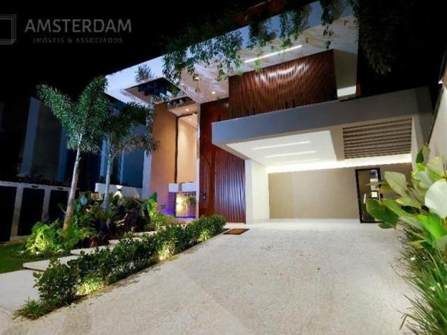 Casa à venda no M17 na Riviera, com 738 m² de área construída, 7 suítes, rooftop com 126 m²