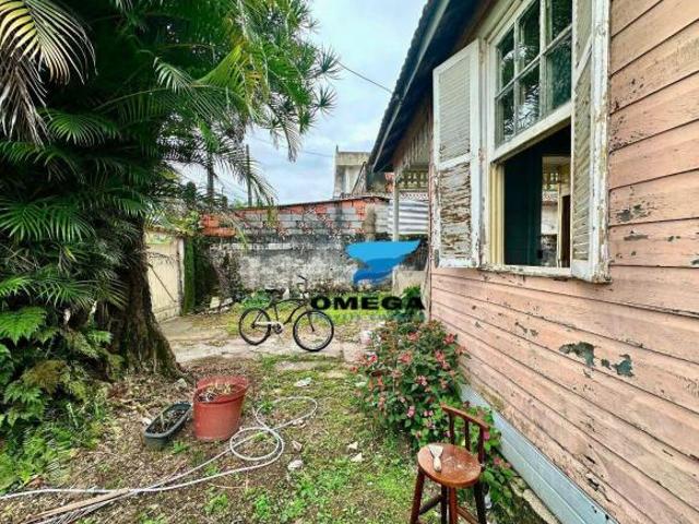 Casa à venda no Santa Rosa no Guarujá | Omega Imóveis