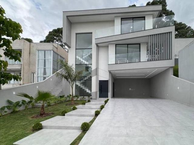 Casa à venda no Real Park Arujá – Arujá | 4 suítes | Fundo para reserva | Ref. 2014