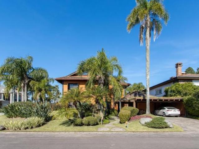 Casa à venda no Terra Ville com 6 dormitórios e fundo para o lago