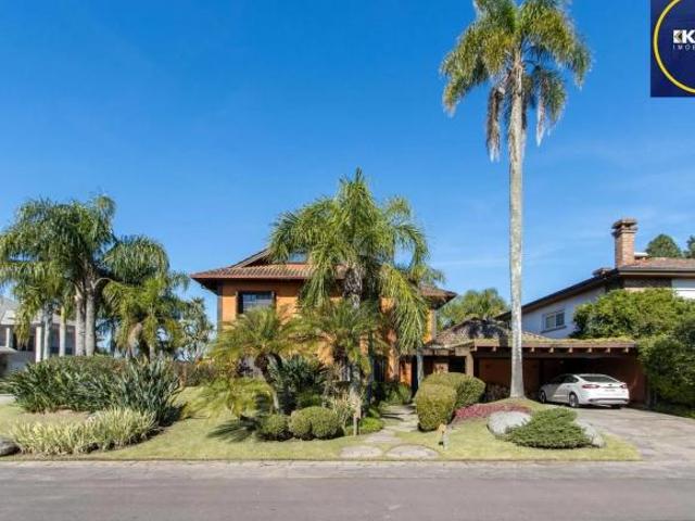 Casa à venda no Terra Ville com 6 dormitórios e fundo para o lago