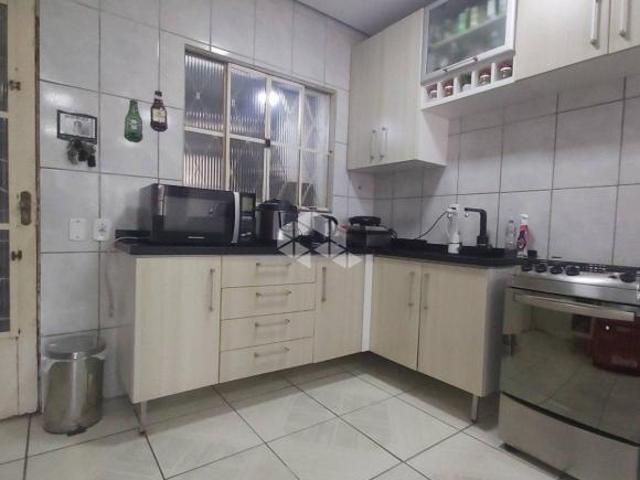 Casa a venda na Av. Oscar Pereira 3 dormitórios Semimobiliada