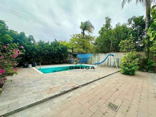 Casa à venda na Enseada no Guarujá | Omega Imóveis