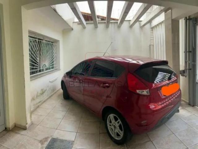 Casa a venda na mooca com entrada lateral, 3 quartos e quintal