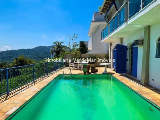 Casa à venda na Península, praia da Enseada em Guarujá, litoral de São Paulo