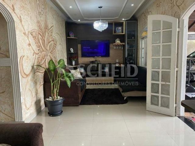 Casa à Venda na Praia Grande Vila Mirim 3 Dormitórios, 6 Vagas, Piscina e Área Gourmet Completa